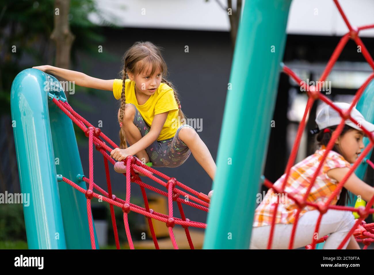 happy excited kids having fun together on playground Stock Photo - Alamy