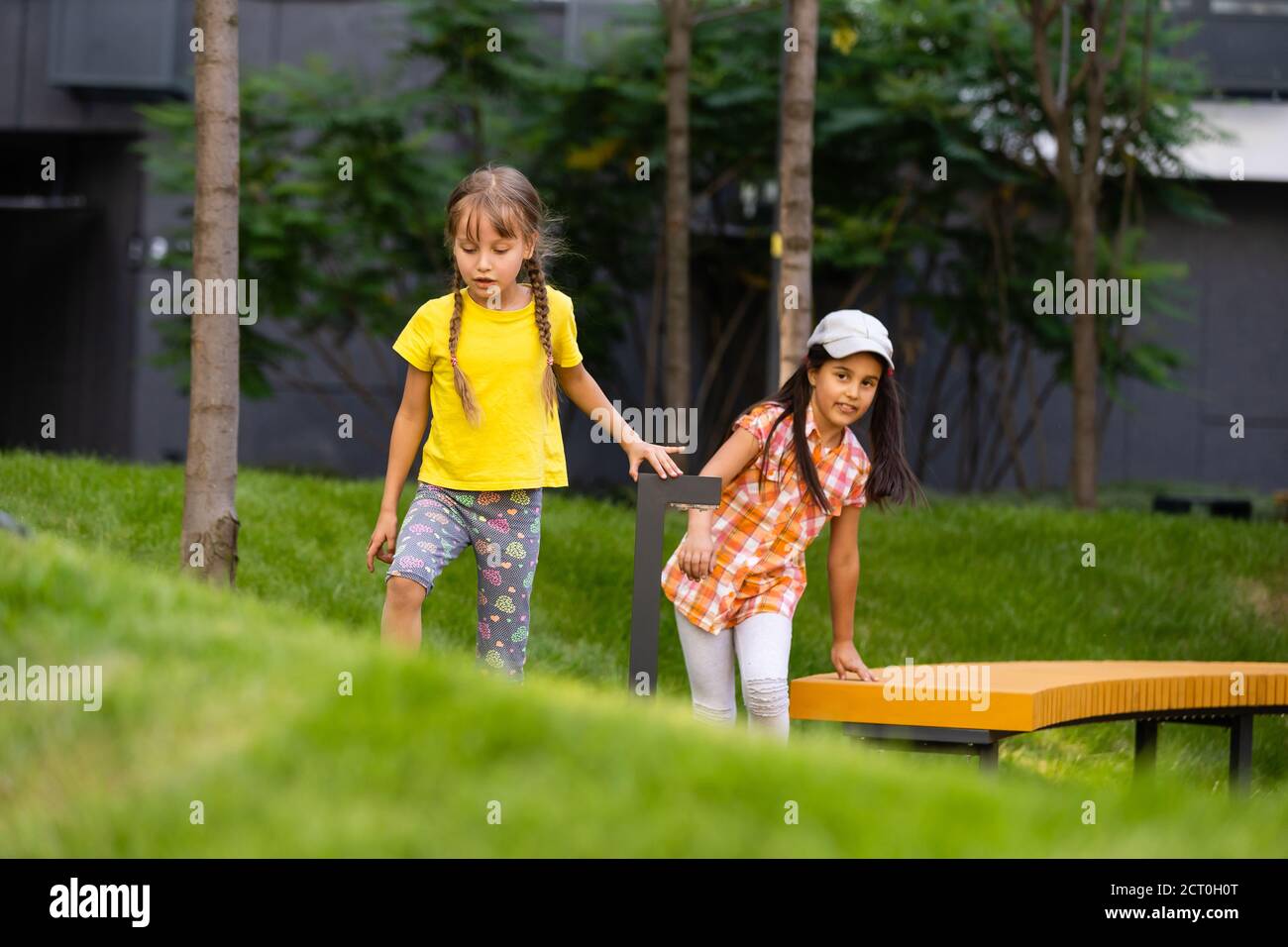 happy excited kids having fun together on playground Stock Photo - Alamy