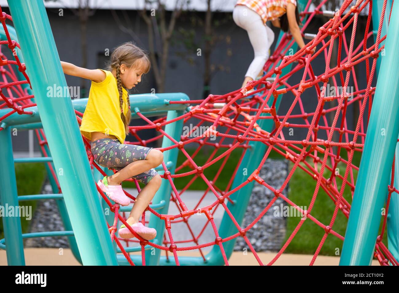 Happy children playing outdoors, children on the playground Stock Photo ...