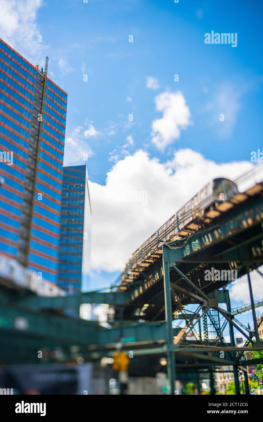 New York City subway runs on the elevated railway track at Queensboro ...