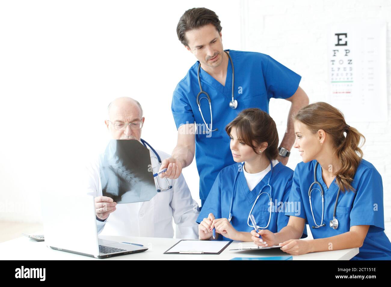 Group nurses looking at computer hi-res stock photography and images ...