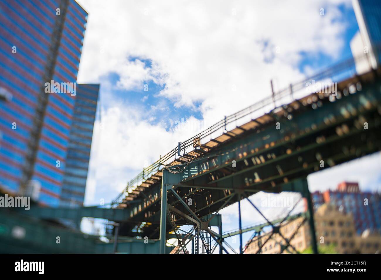 New York City subway runs on the elevated railway track at Queensboro ...