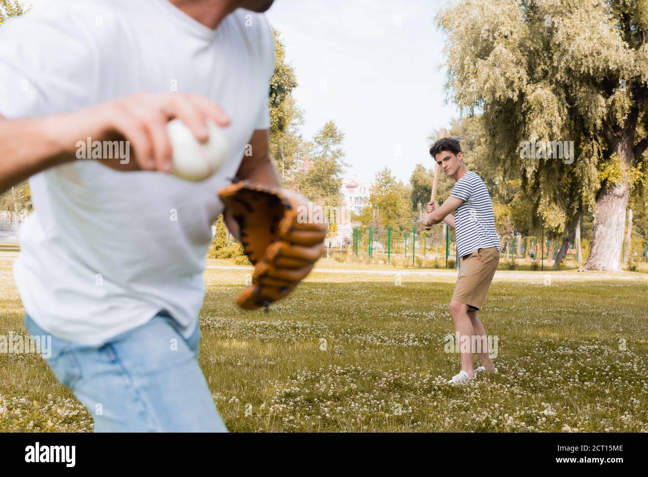 Father son softball glove park hi-res stock photography and images - Alamy