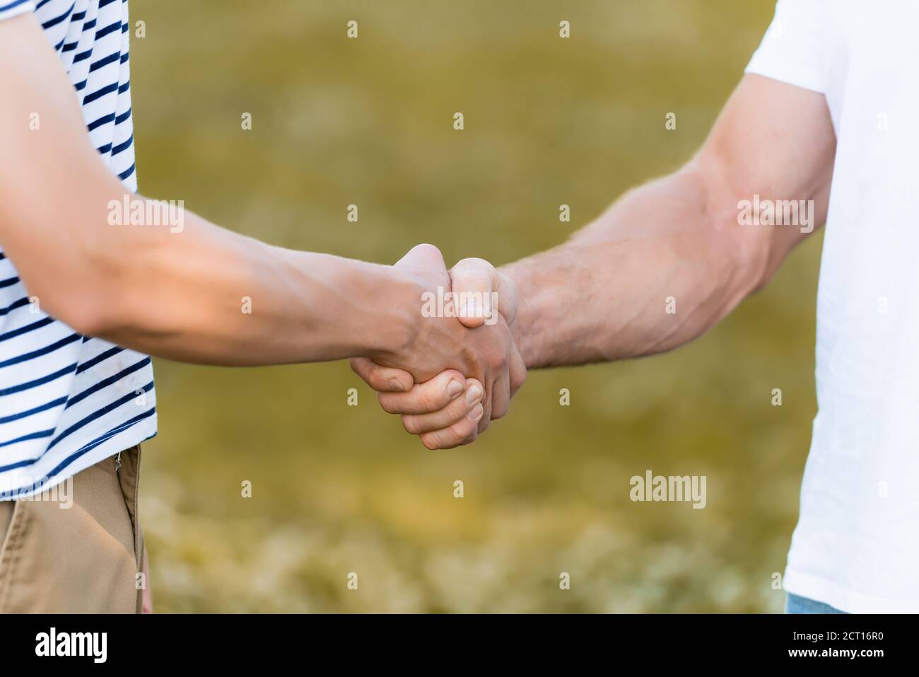 Teenager handshake hi-res stock photography and images - Alamy