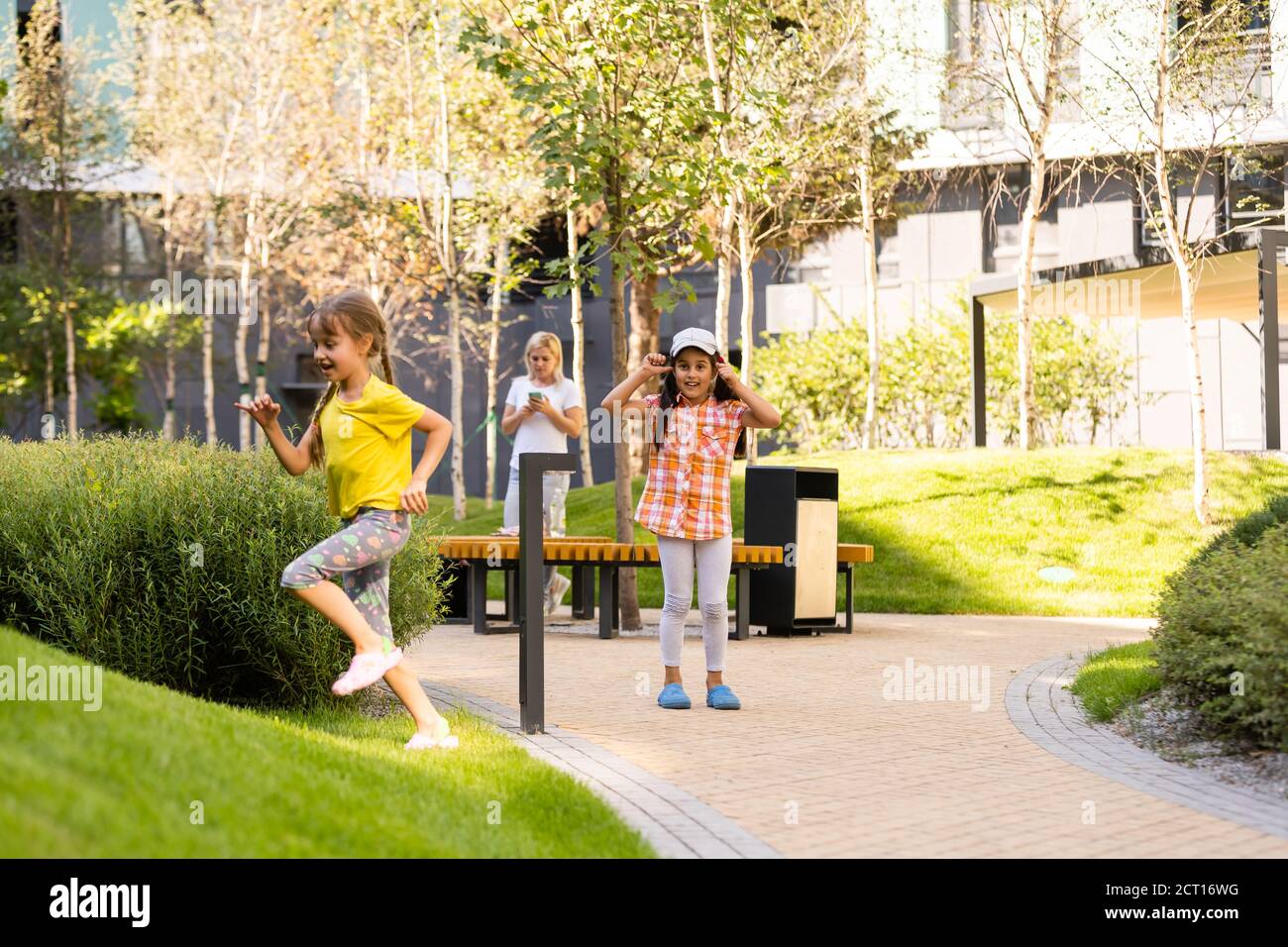 Happy children playing outdoors, children on the playground Stock Photo ...