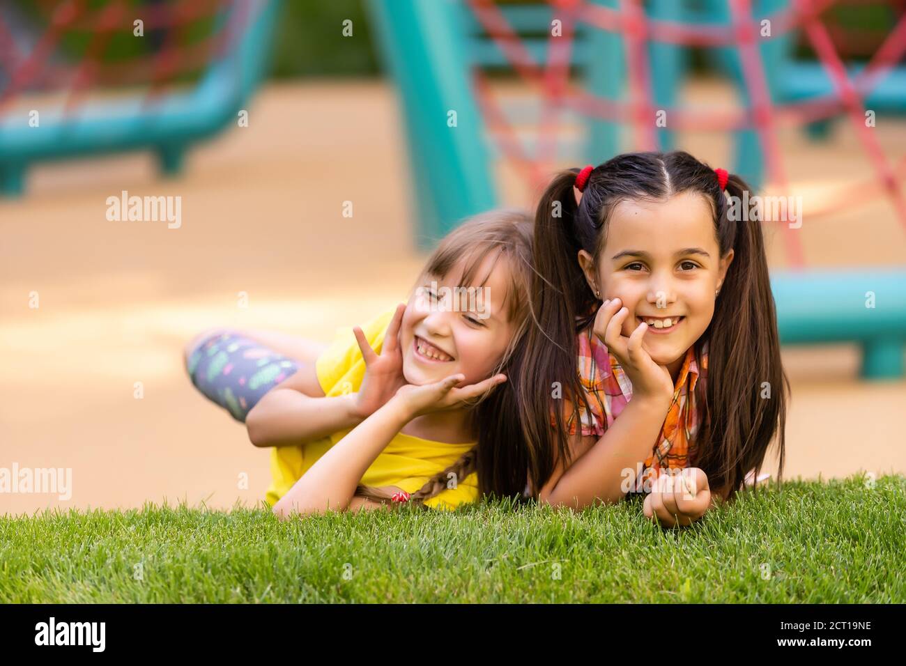 happy excited kids having fun together on playground Stock Photo - Alamy