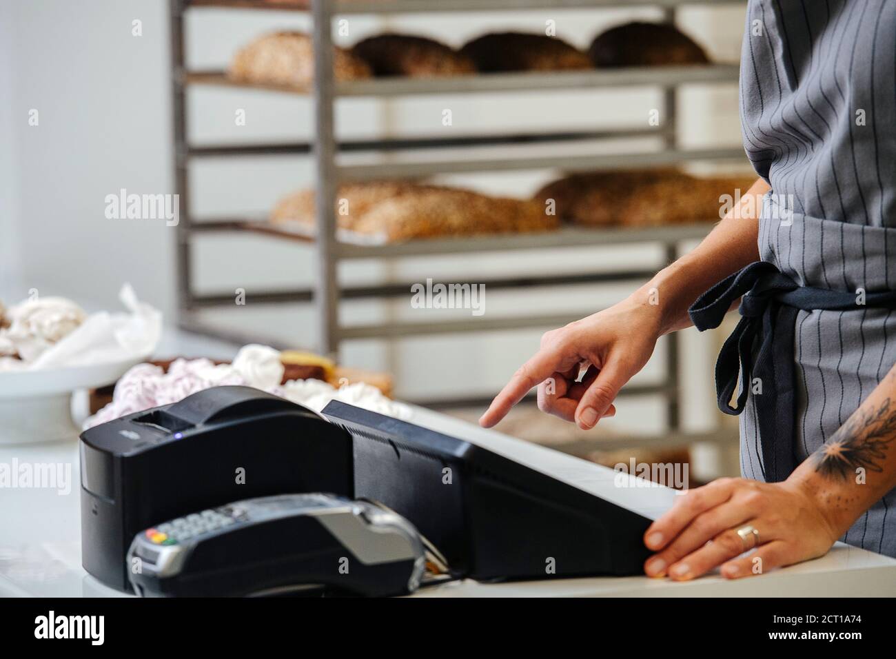 Calculating young adult hi-res stock photography and images - Alamy