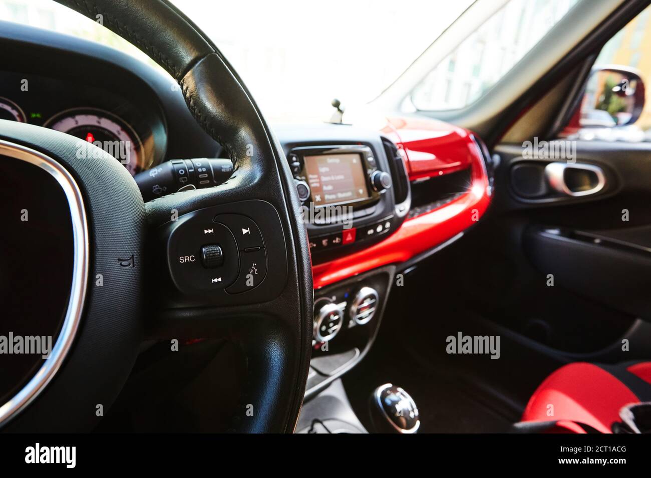 Modern black steering wheel with multifunction buttons for quick ...