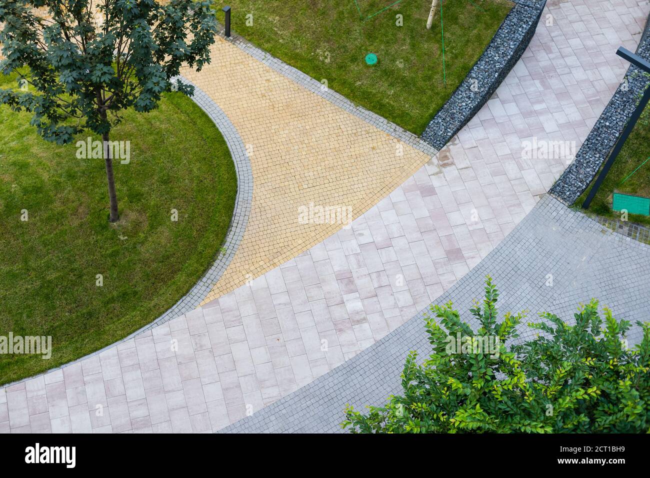 Stone Pathway in a Lush Green Park Stock Photo - Alamy