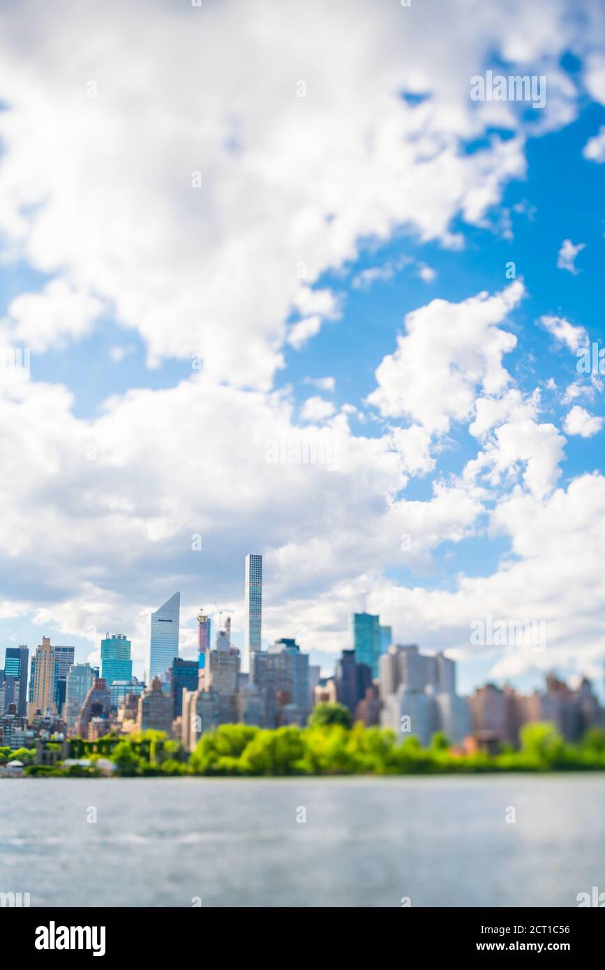 Clouds float over the Midtown Manhattan from Queens ward at New York ...
