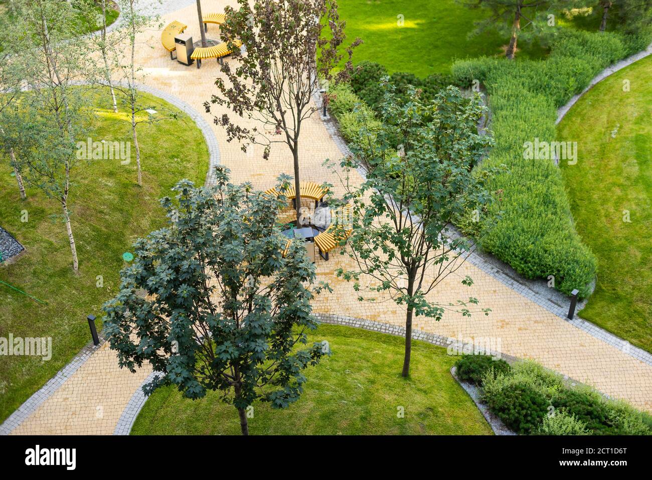 Stone Pathway in a Lush Green Park Stock Photo - Alamy