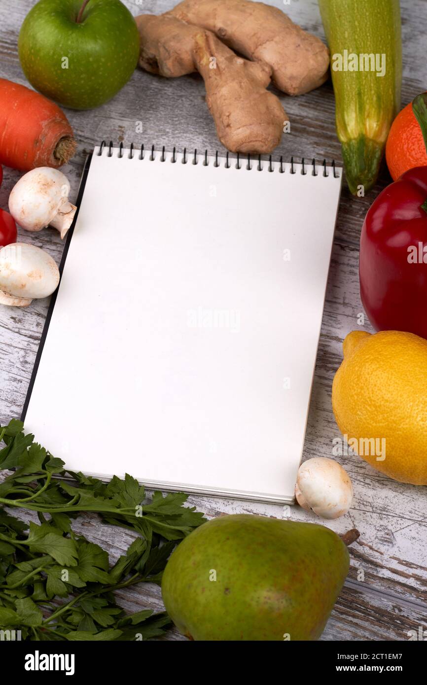 Notepad with fruit and vegetables Stock Photo - Alamy