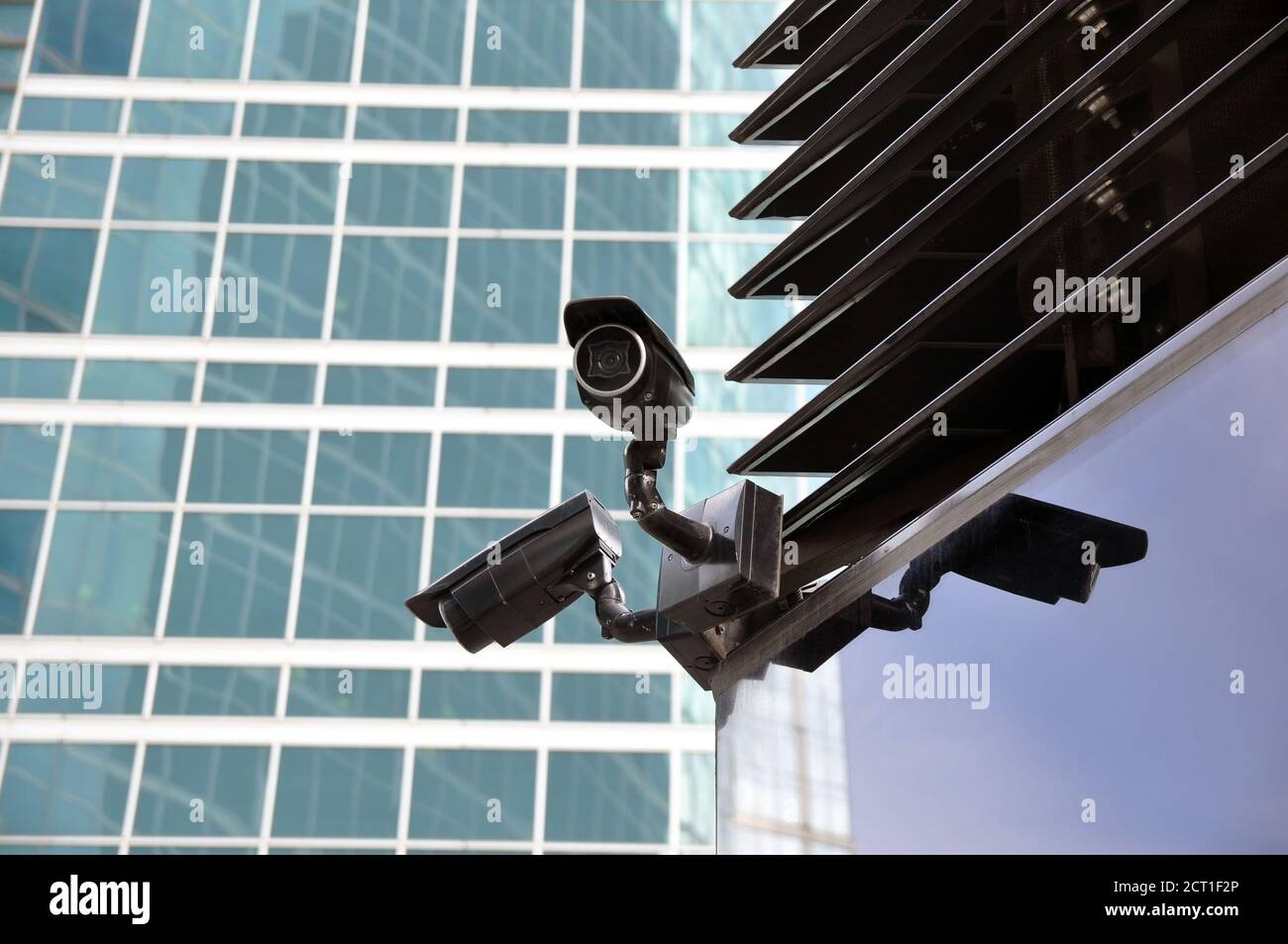 Security cameras in the structure of a modern city Stock Photo - Alamy