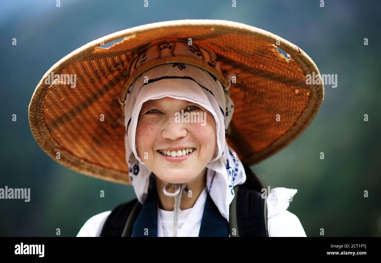 Japanese pilgrim (Henro) on the mountain path to Shosanji temple ...