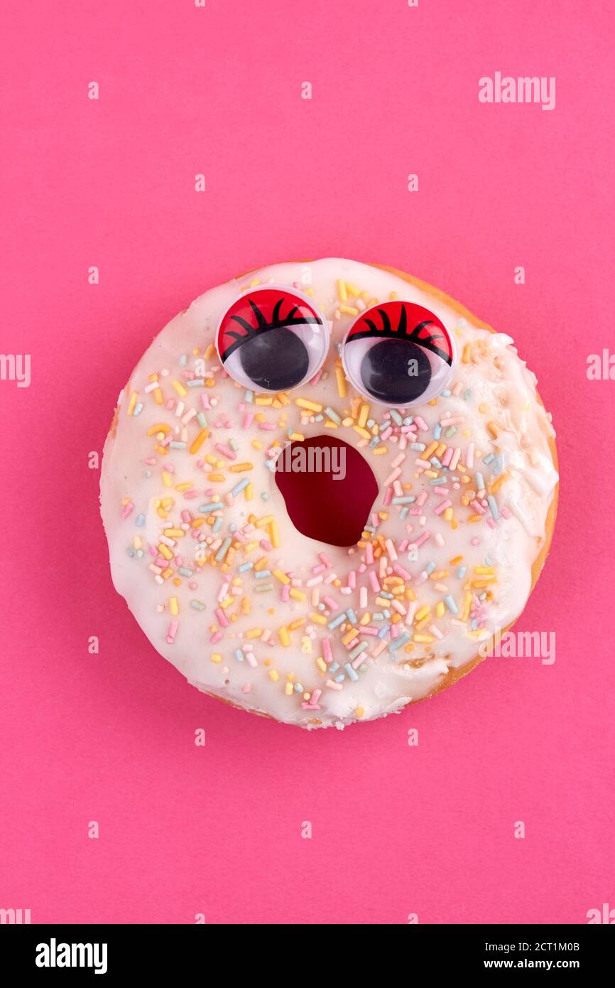 Female donut with funny eyes Stock Photo - Alamy