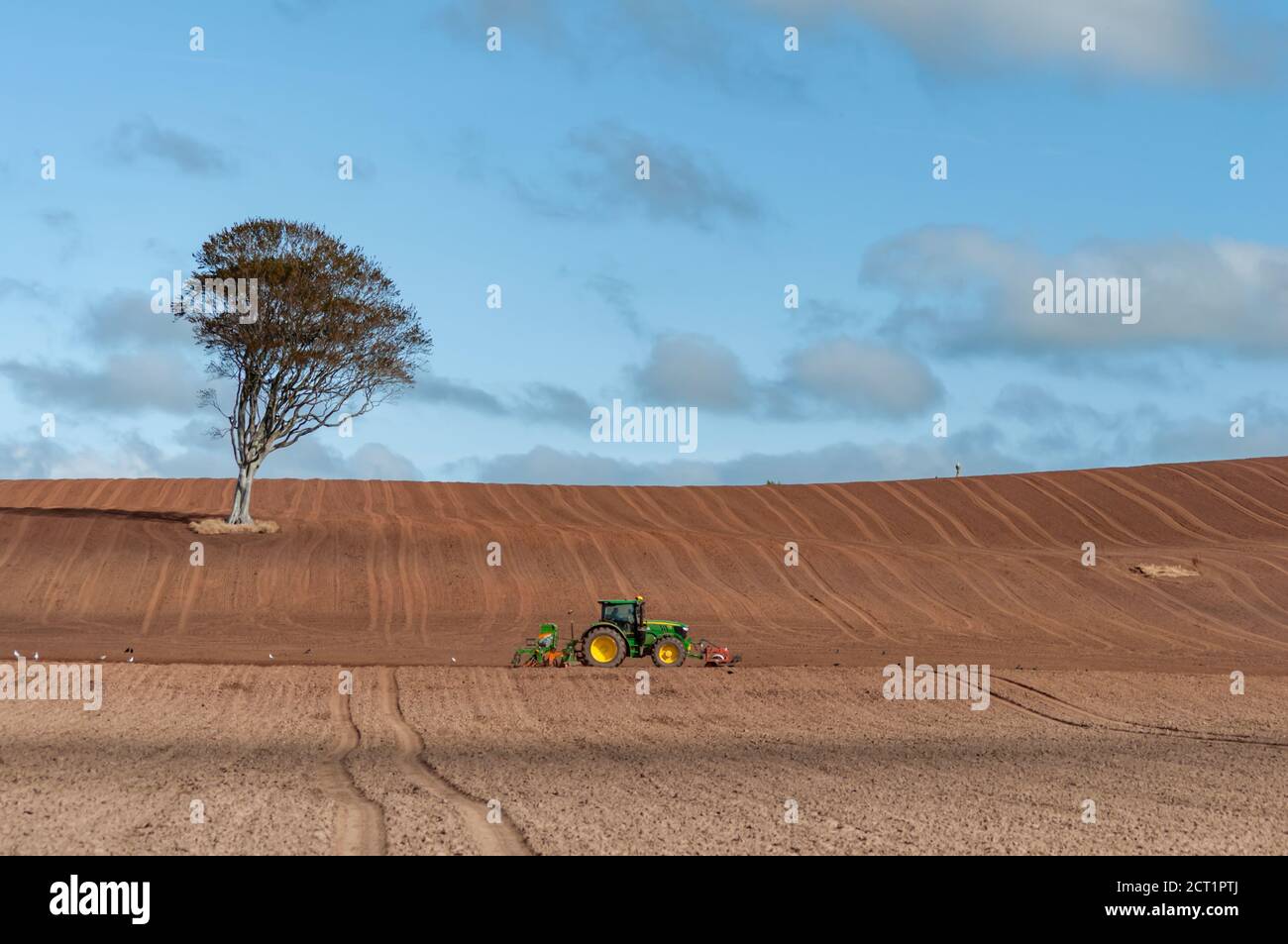Tractor ploughing coastal farming hi-res stock photography and images ...