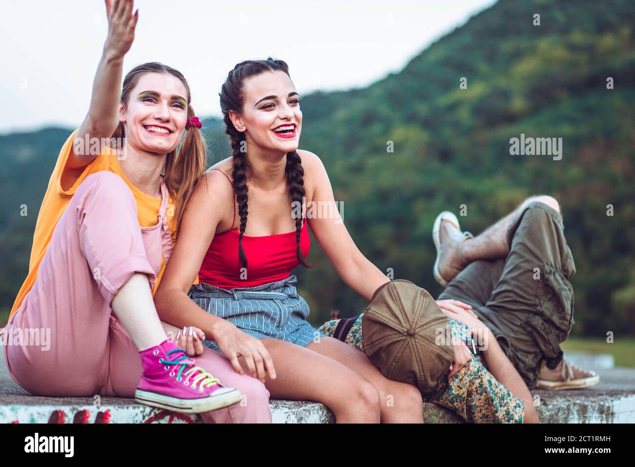Two female friends have fun, laugh about something Stock Photo - Alamy
