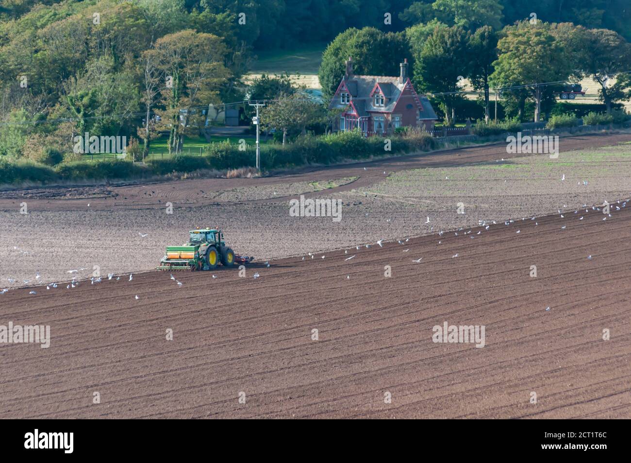 Tractor ploughing coastal farming hi-res stock photography and images ...