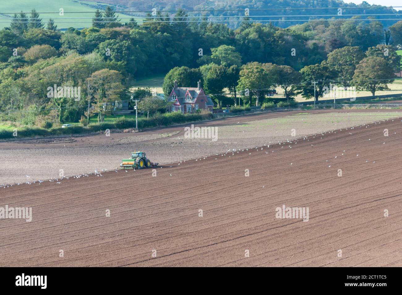 Tractor ploughing coastal farming hi-res stock photography and images ...