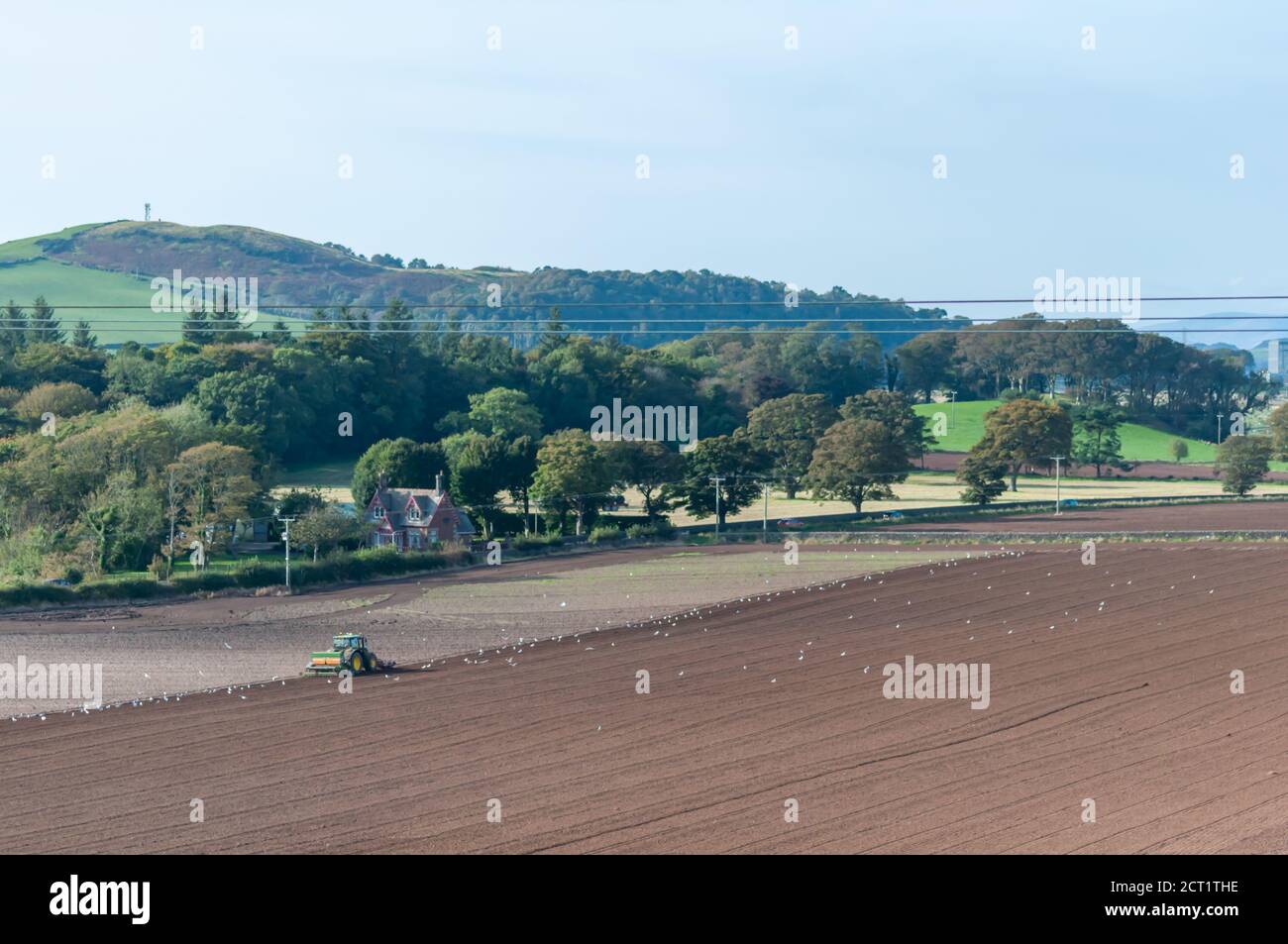 Tractor ploughing coastal farming hi-res stock photography and images ...