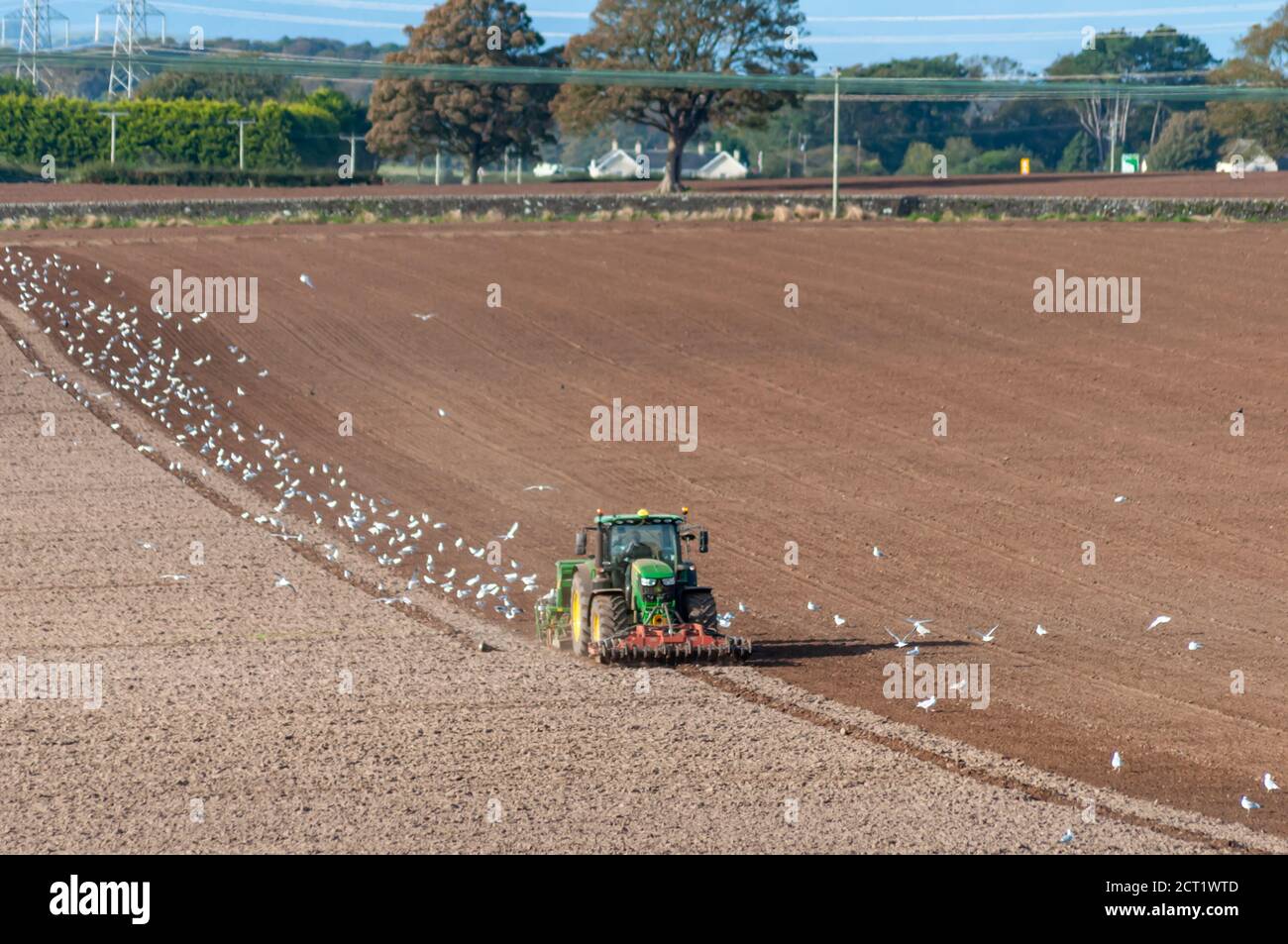 Tractor ploughing coastal farming hi-res stock photography and images ...