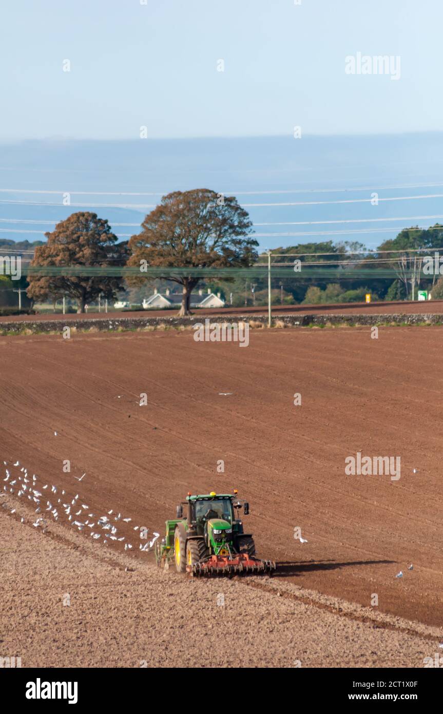 Tractor ploughing coastal farming hi-res stock photography and images ...