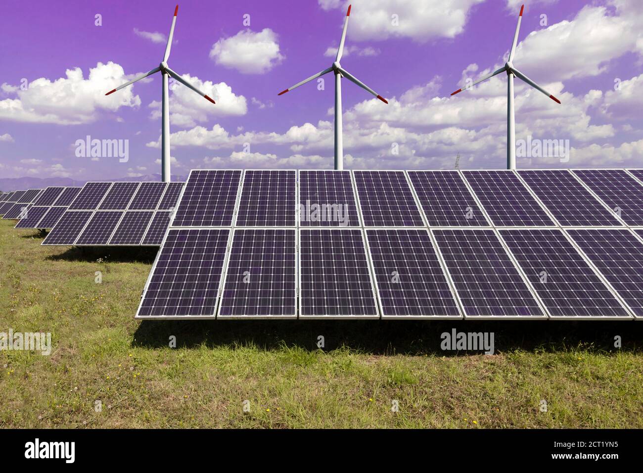 Photo collage of solar panels and wind turbins, alternative electricity ...