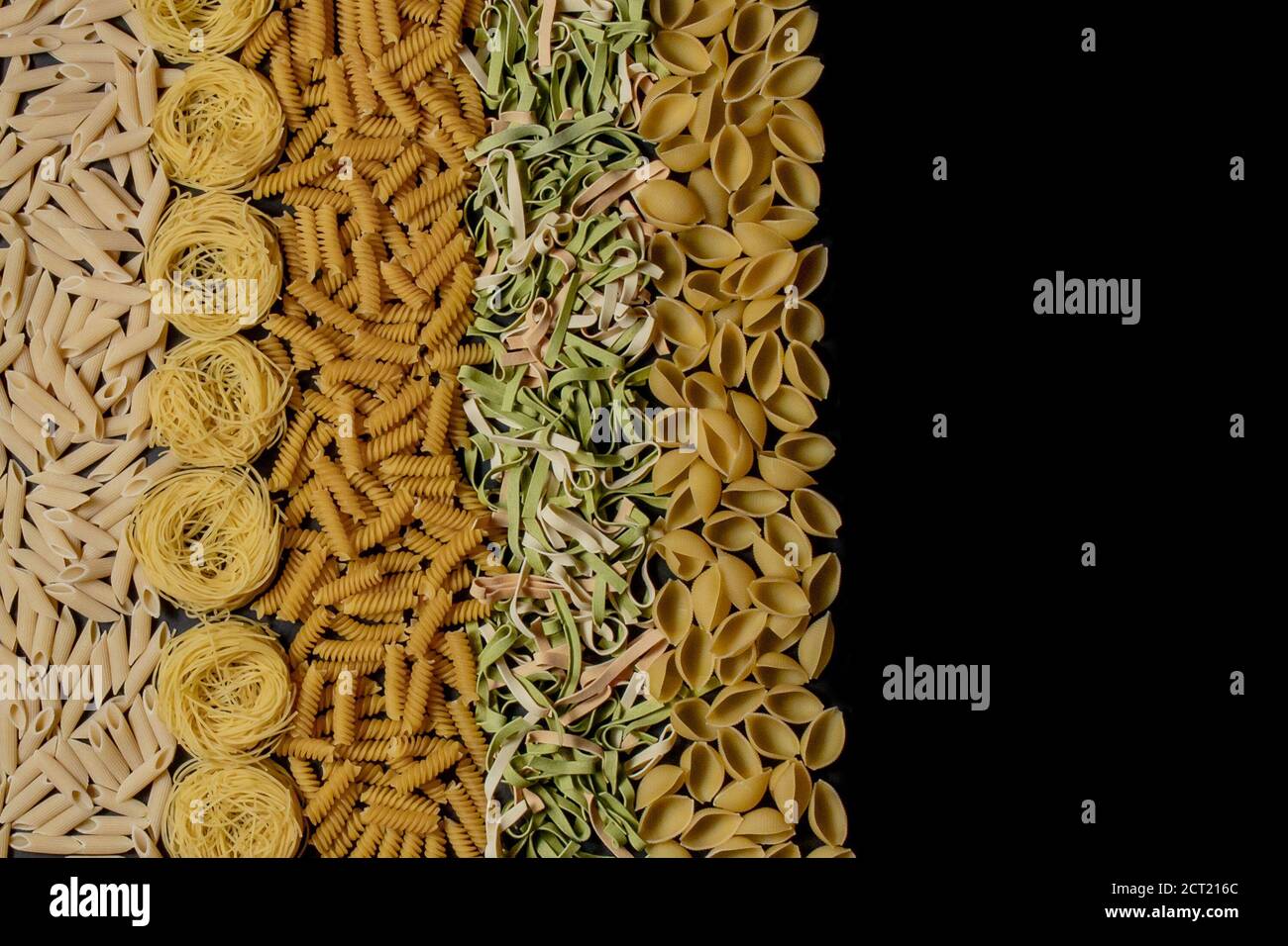 Variety of types and shapes of dry Italian pasta. Italian Macaroni raw ...