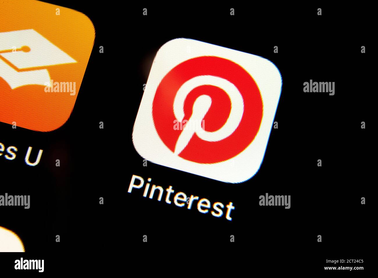 Pinterest app logo on iPhone screen. Cellphone with an icon of a social ...