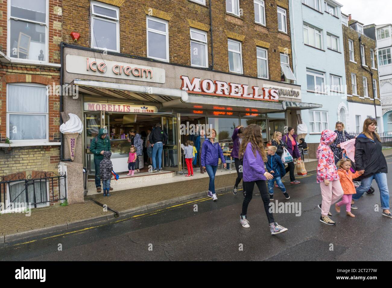 People outside Morellis ice cream parlour on a wet day in Broadstairs ...
