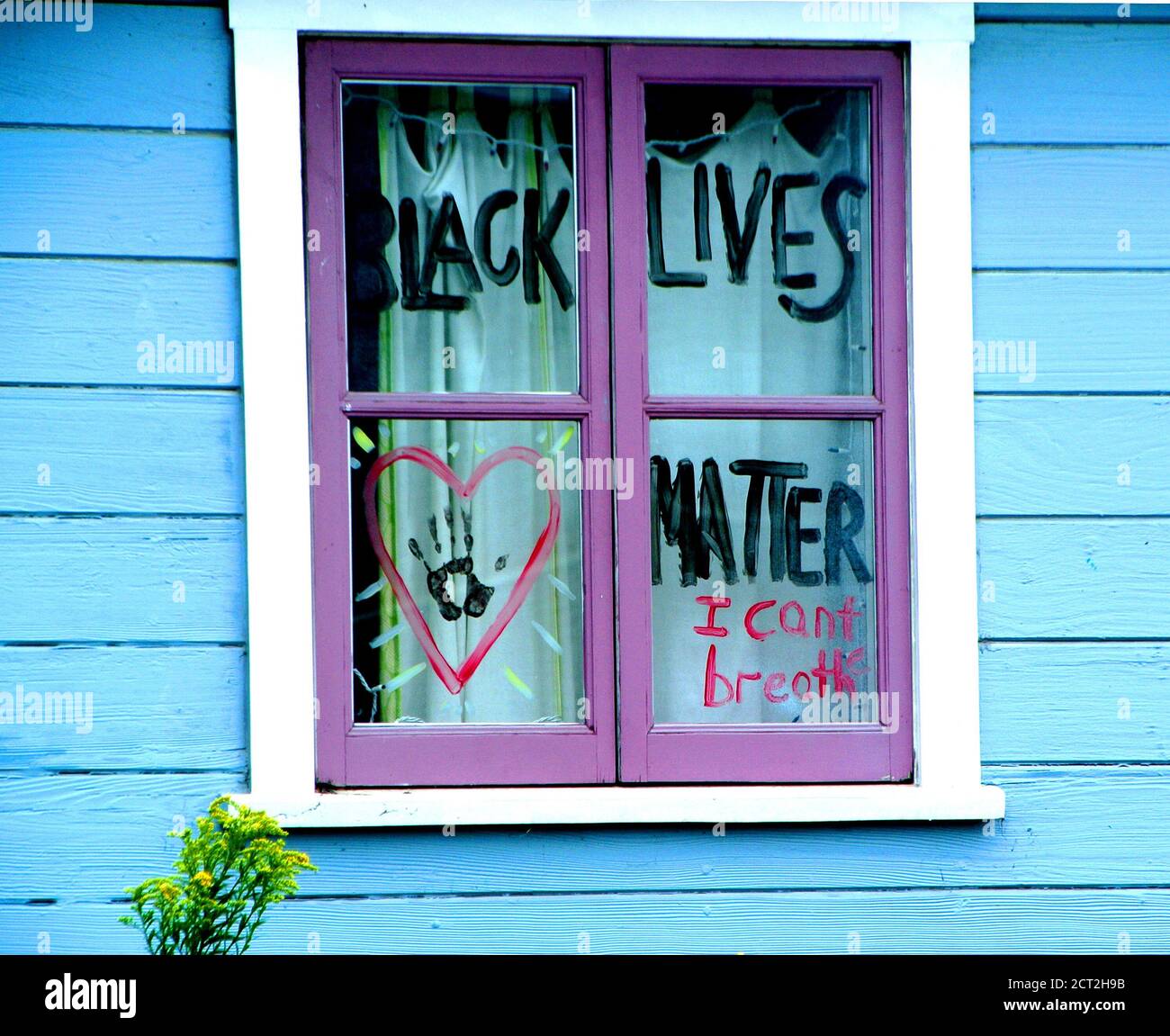 window sign with hearts in mendocino california supporting black lives ...
