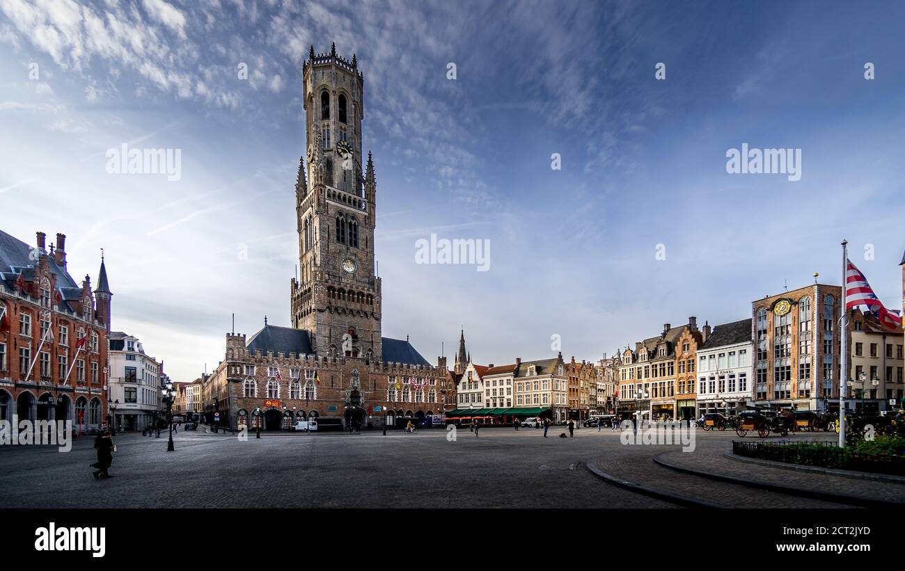 Sunrise over Market Square in the center of Bruges with the may ...