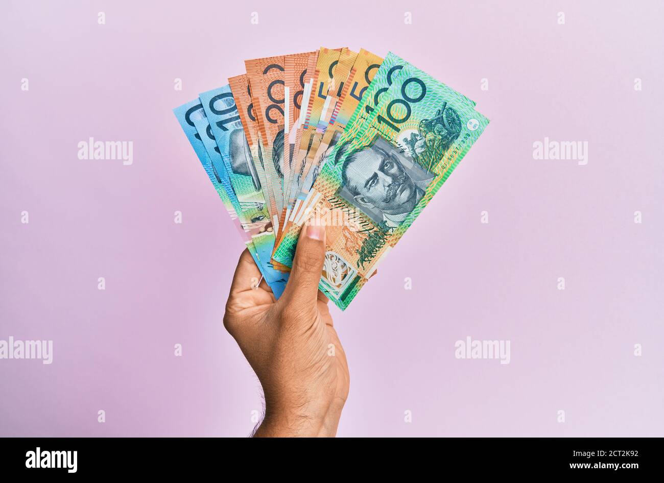 Hispanic hand holding australian hi-res stock photography and images ...