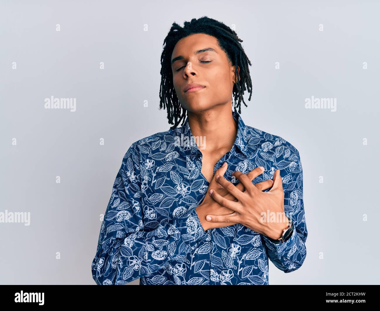 Young african american man wearing 80s style shirt smiling with hands ...