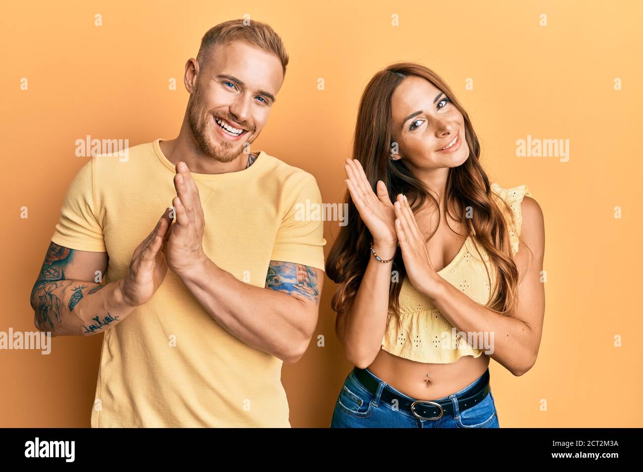 Young couple of girlfriend and boyfriend hugging and standing together ...