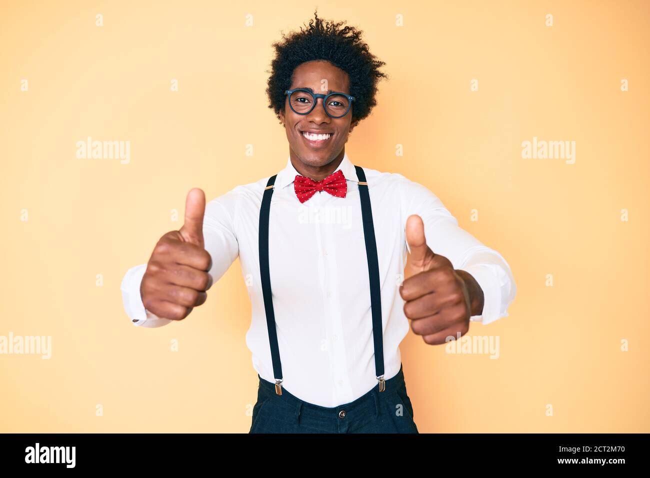 Handsome african american man with afro hair wearing hipster elegant ...