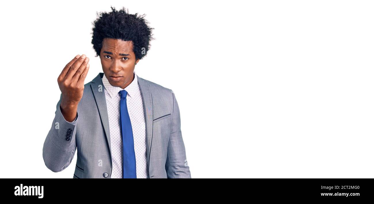 Handsome african american man with afro hair wearing business jacket ...