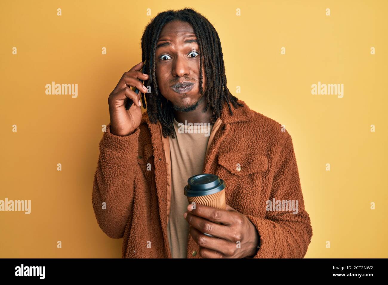 African american man with braids having conversation talking on the ...