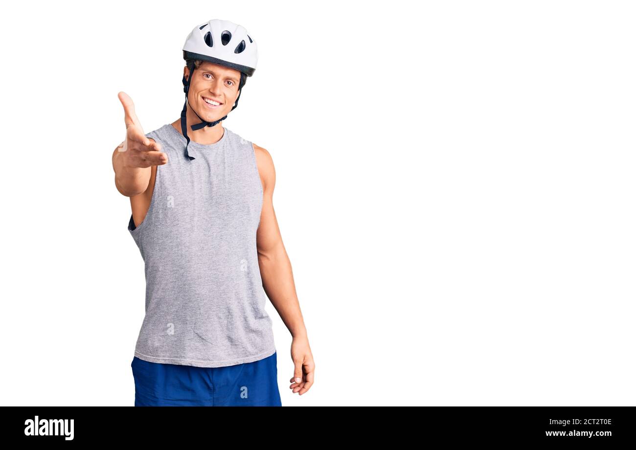 Shaking hands bike hi-res stock photography and images - Alamy