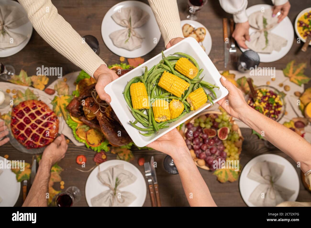 Young man eating baked beans hi-res stock photography and images - Alamy