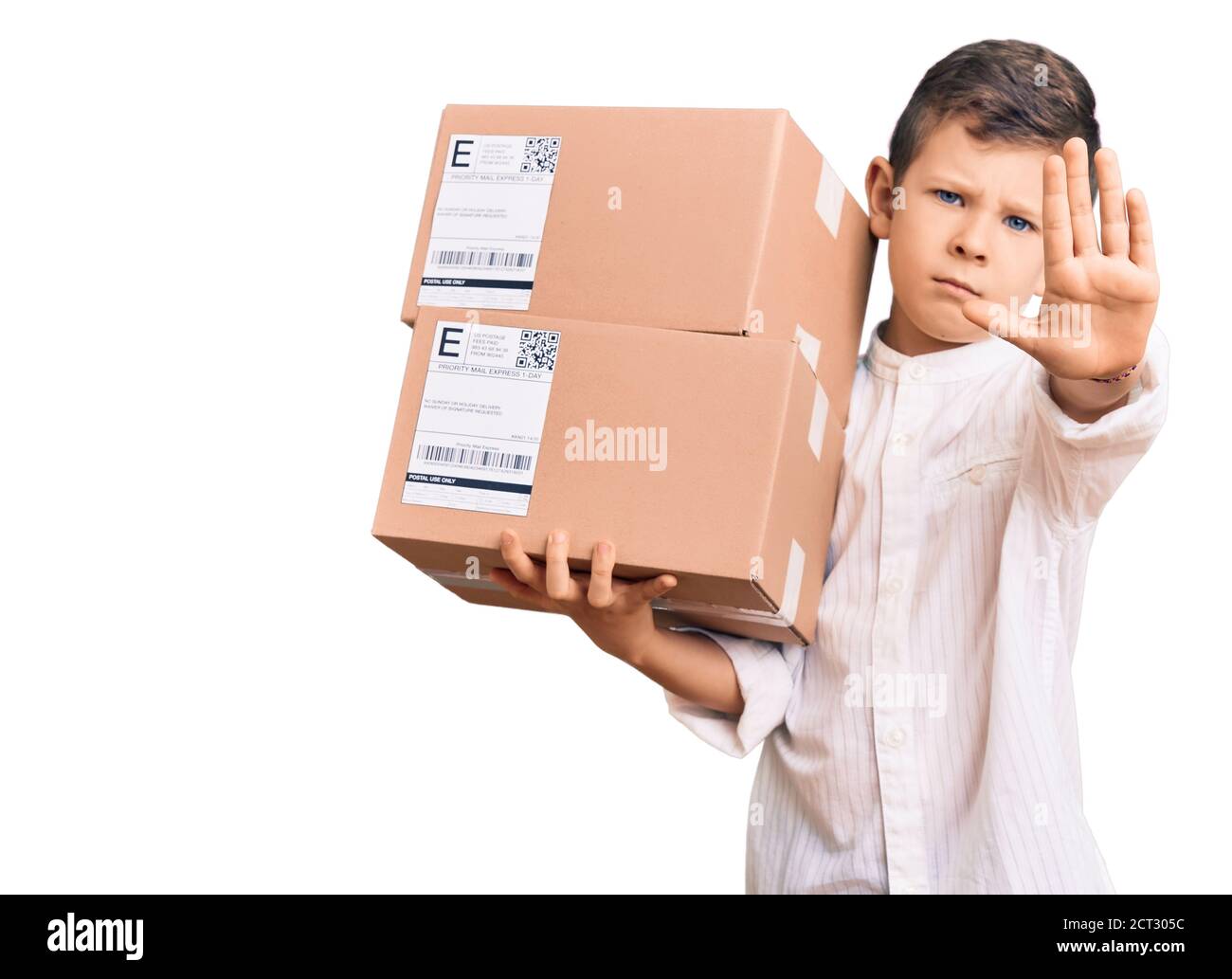 Cute blond kid holding delivery package with open hand doing stop sign ...