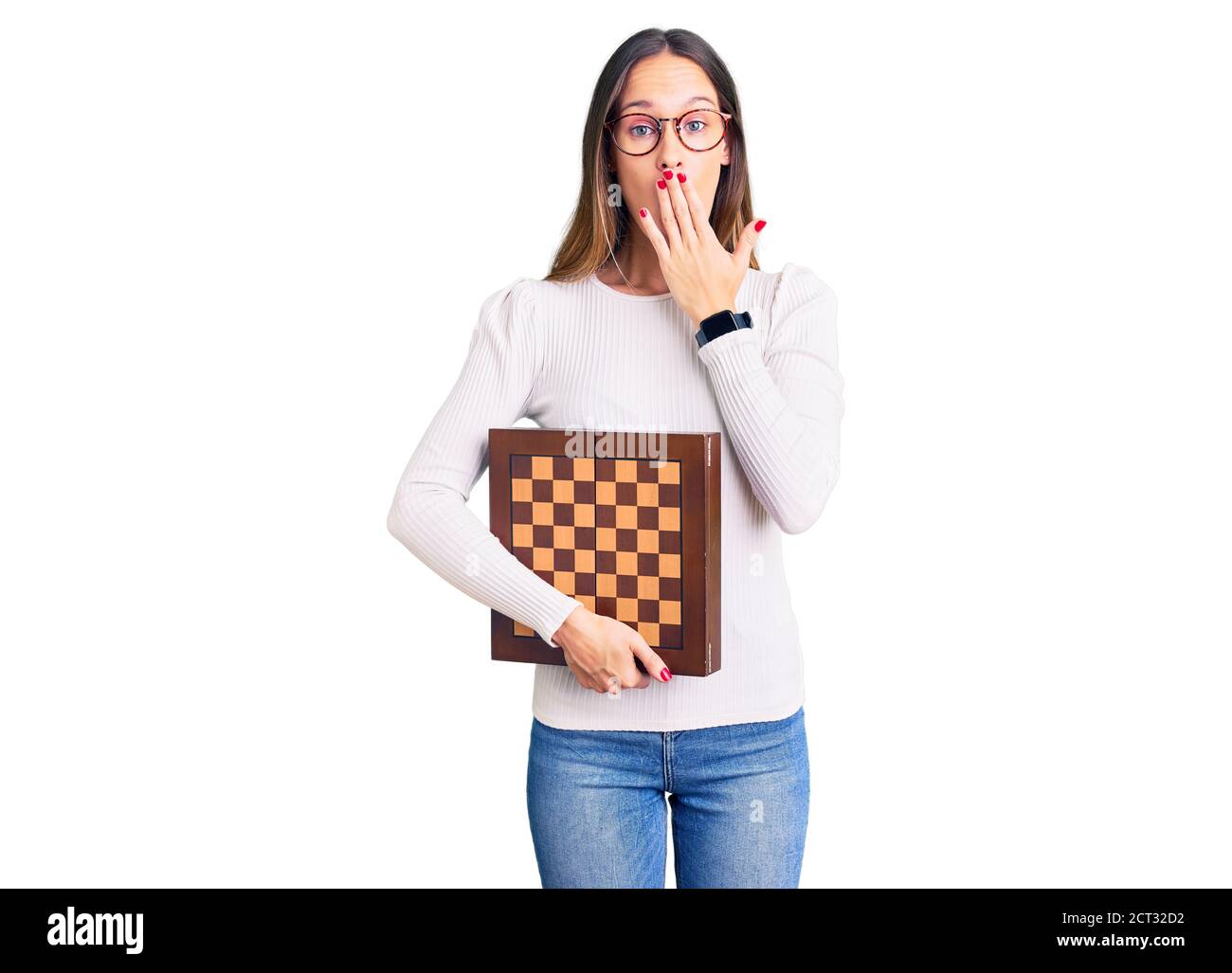Young upset woman playing chess hi-res stock photography and images - Alamy