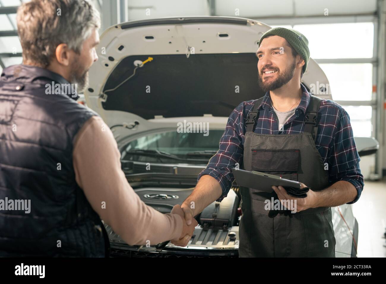 Happy customer car repair hi-res stock photography and images - Alamy