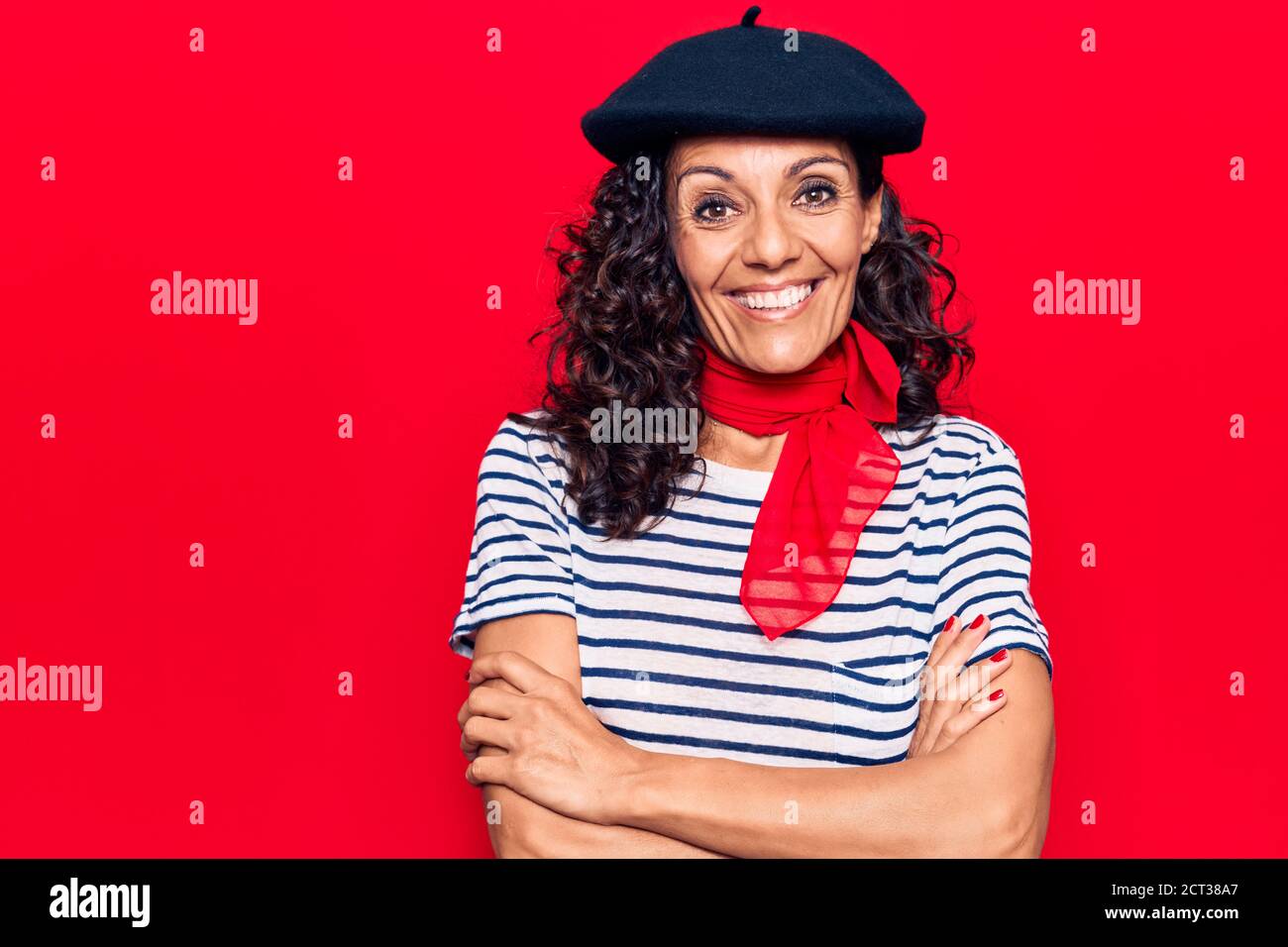 Middle age beautiful woman wearing french beret happy face smiling with ...