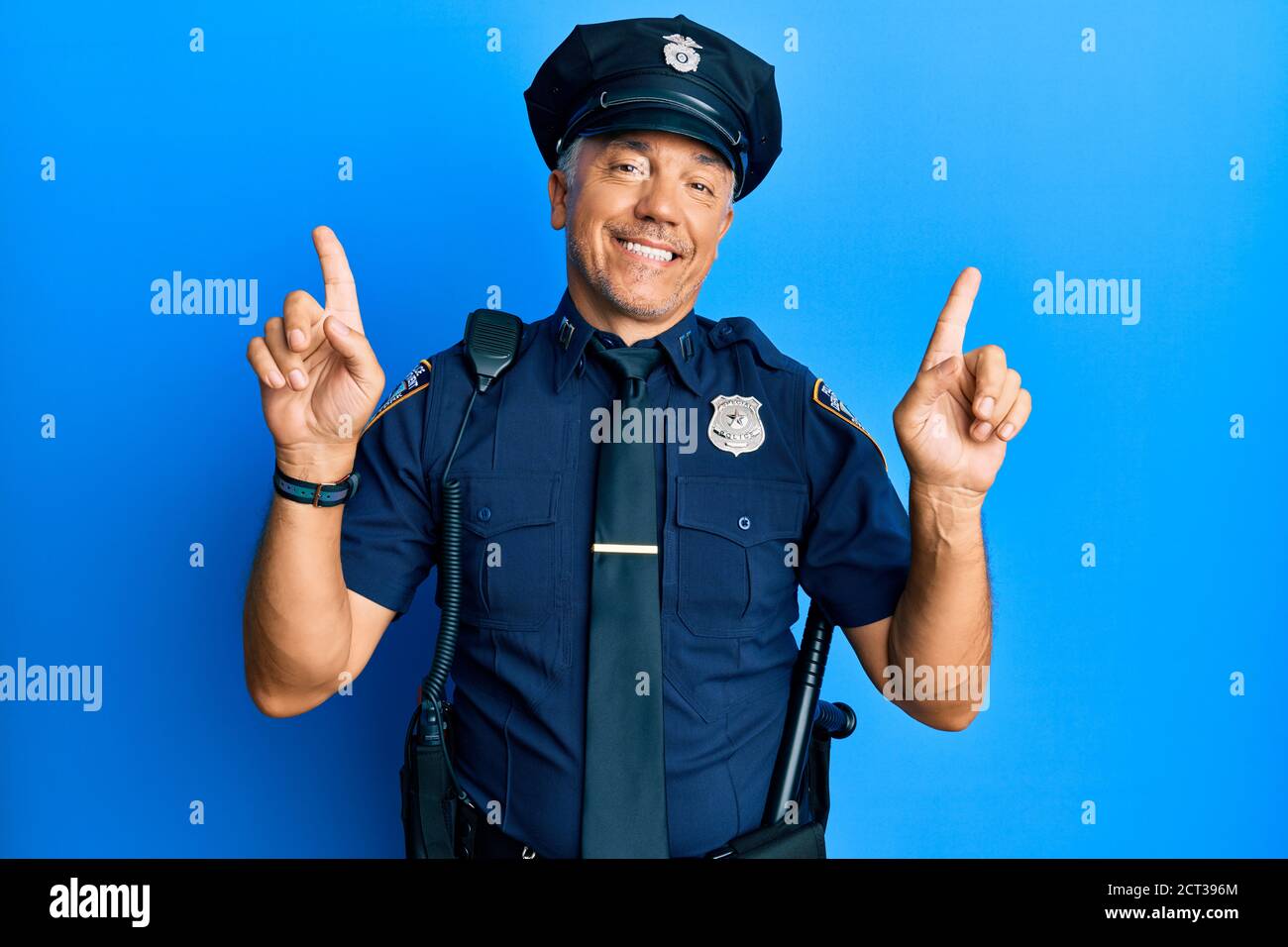 Police officer showing directions hi-res stock photography and images ...