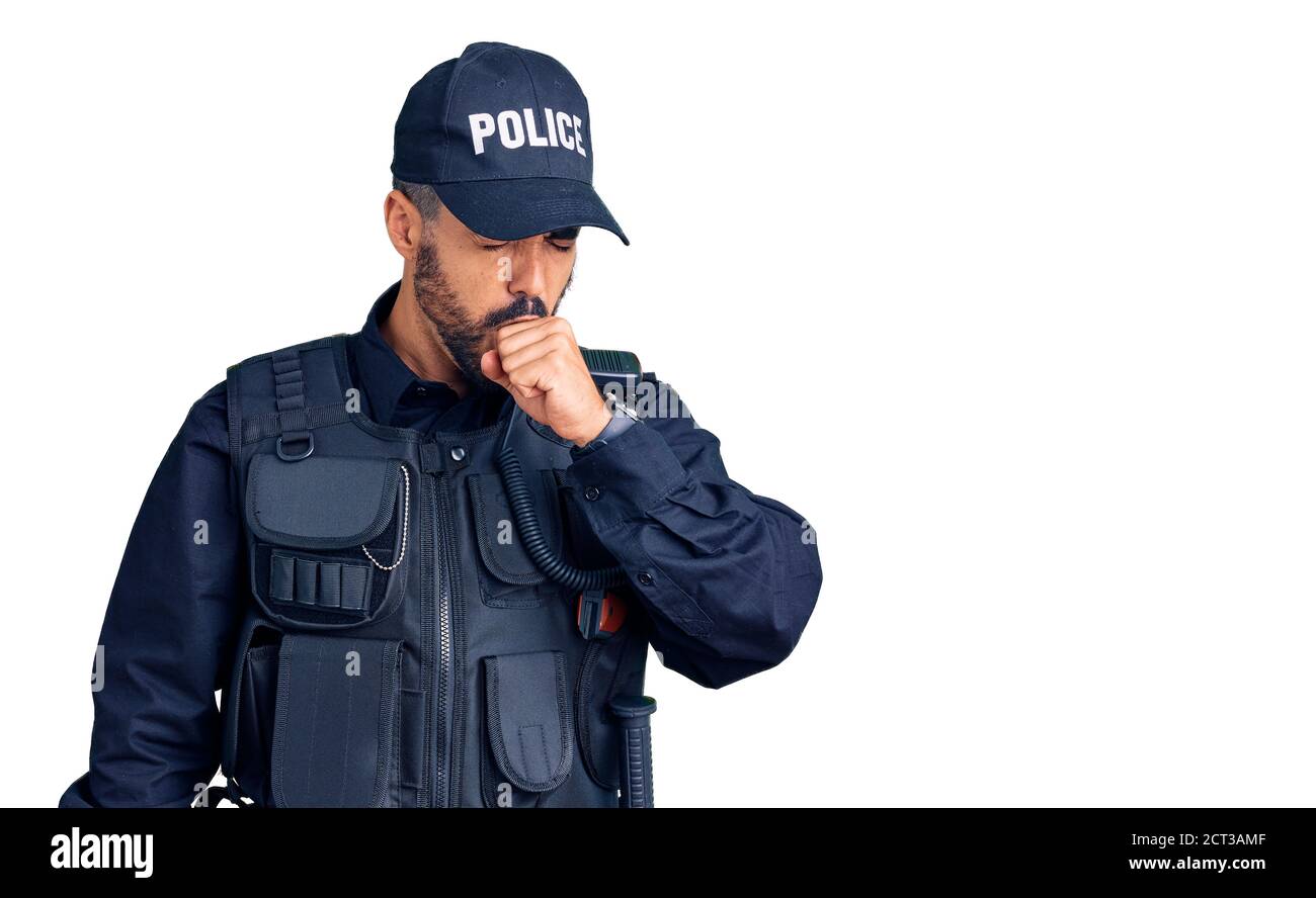 Young hispanic man wearing police uniform feeling unwell and coughing ...