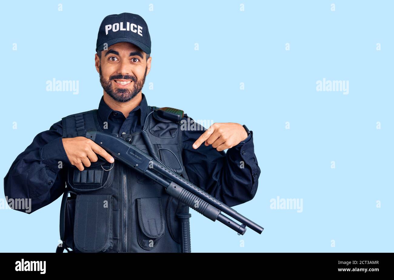 Male police officer pointing gun hi-res stock photography and images ...