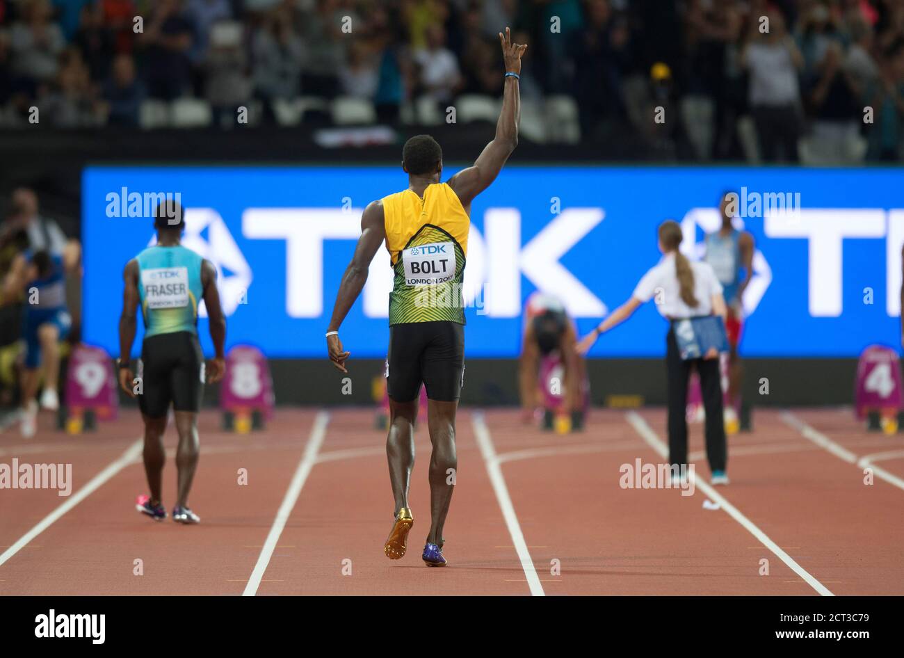 Usain Bolt salutes the London crowd at his farewell Championships ...