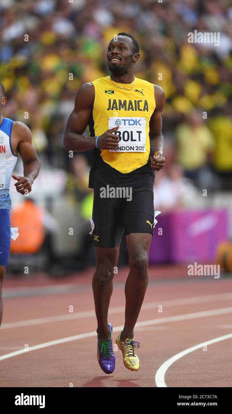 Usain Bolt smiles as he qualifies for the mens 100 metre final. World ...