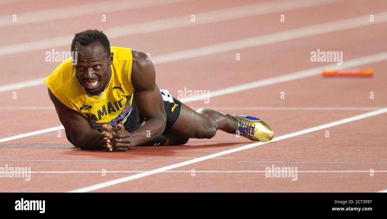 Usain Bolt in despair after pulling up injured in the Mens 4 x 100m ...